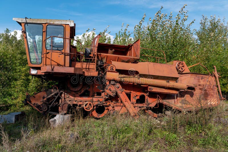 Old Rusty Agricultural Machinery. Abandoned Harvester, Tractor Stock ...