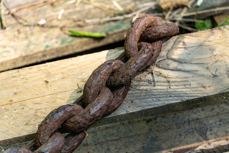 An Old Rusty Anchor Chain. Fixing the Boat on the Pier Stock Photo ...