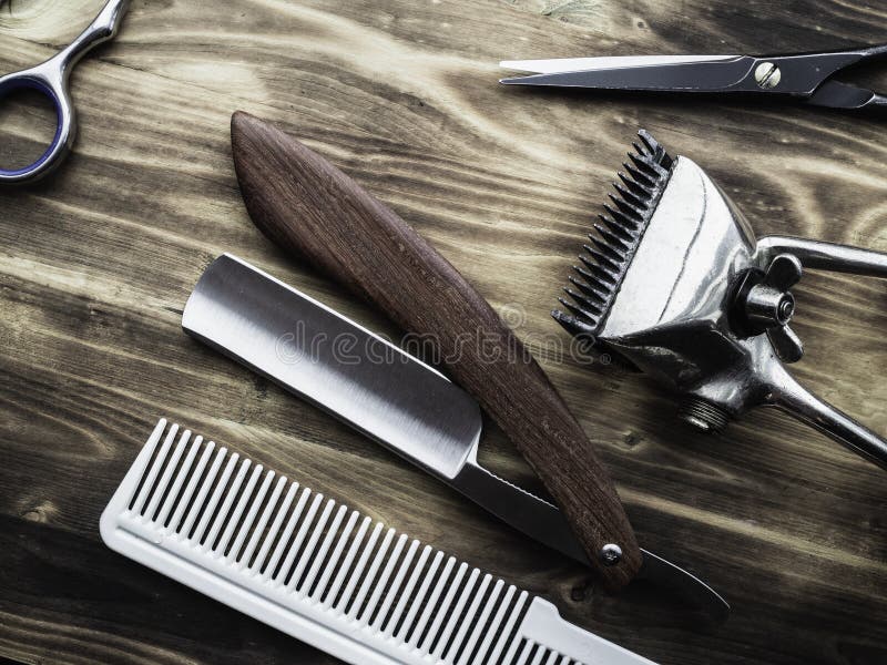 Old Rusty Barber Shop Tools on Wood Background Stock Photo - Image of ...