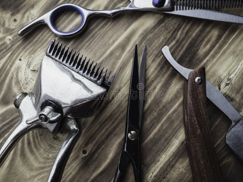 Old Rusty Barber Shop Tools on Wood Background Stock Photo - Image of ...