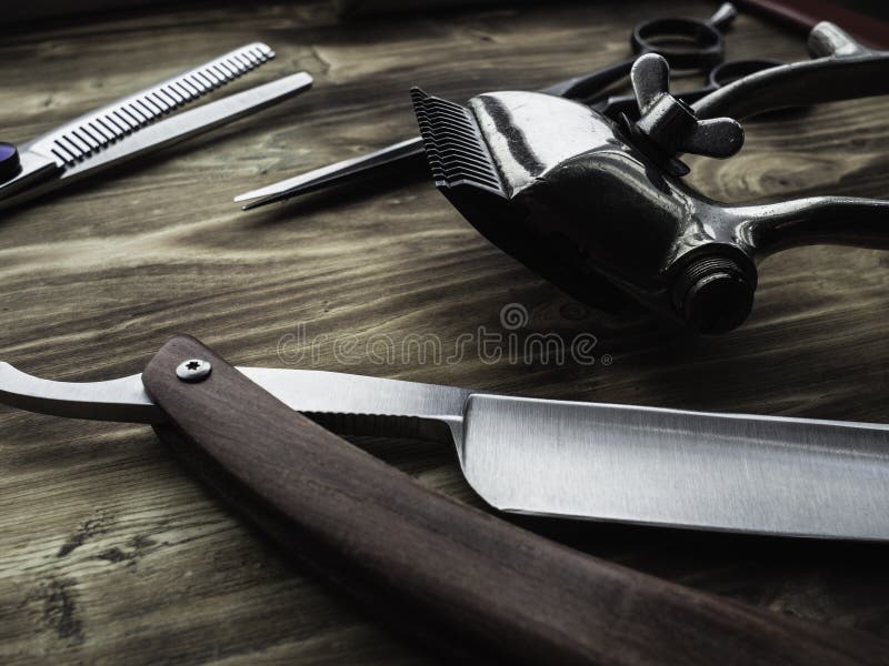 Old Rusty Barber Shop Tools on Wood Background Stock Photo - Image of ...