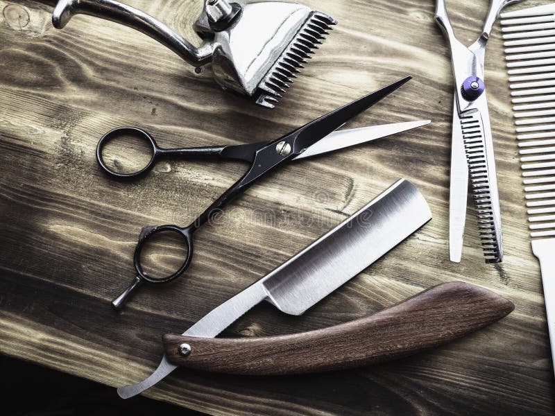 Old Rusty Barber Shop Tools on Wood Background Stock Photo - Image of ...