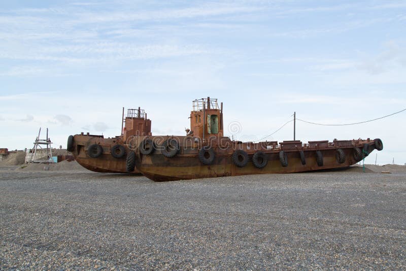 Old Rusty Barges on Seacoast Stock Photo - Image of metal, sand: 109819416