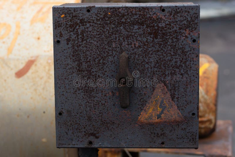 An old, rusty batch switch stock image. Image of electricity - 176848863