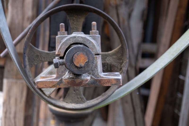 An Old and Rusty Belt Drive Stock Photo - Image of heavy, mechanical ...