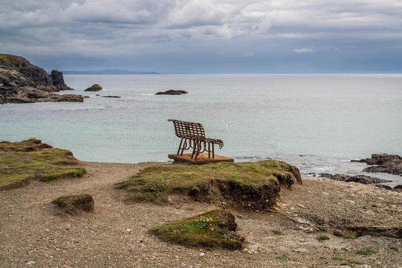 An Old Rusty Bench in Treyarnon Bay, Cornwall, England Stock Photo ...