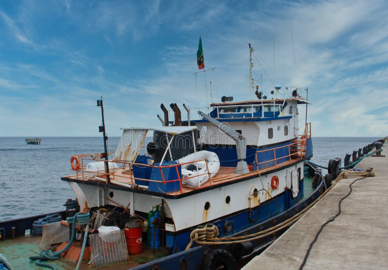 Old Rusty Tugboat at Dock stock photo. Image of ocean - 44276134
