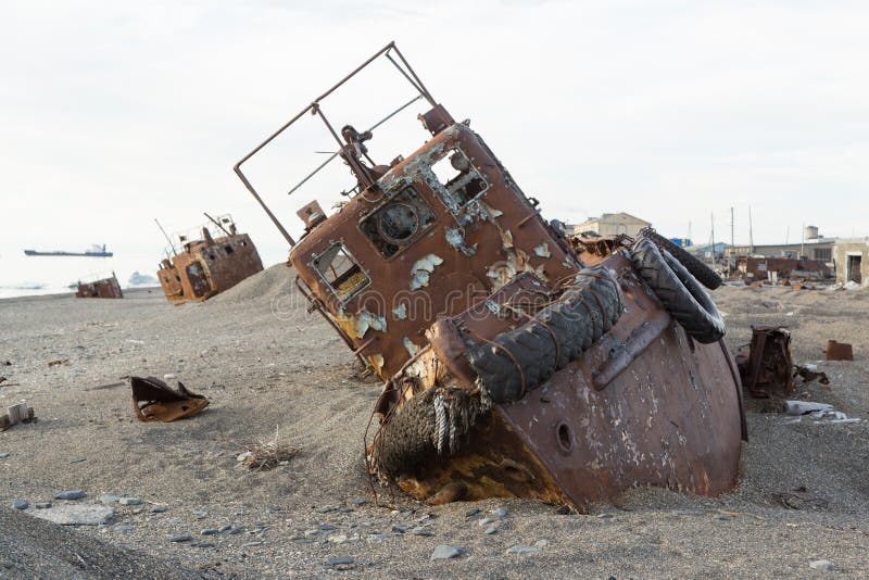 Old Rusty Boat in Sand and a Pebble Stock Photo - Image of scrap ...