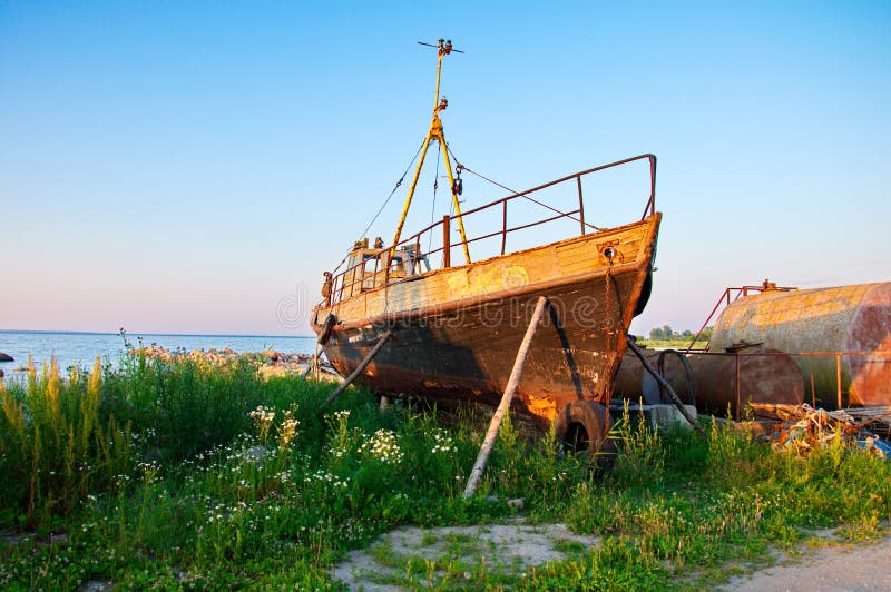 Old Rusty Boat at Seashore with Green Grass Stock Photo - Image of ...