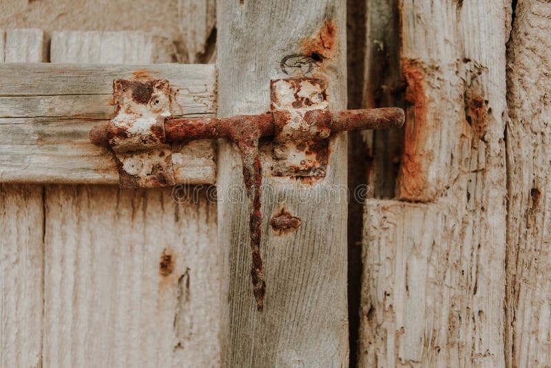 Old Rusty Bolt in an Ancient Wooden Door. Stock Photo - Image of lock ...