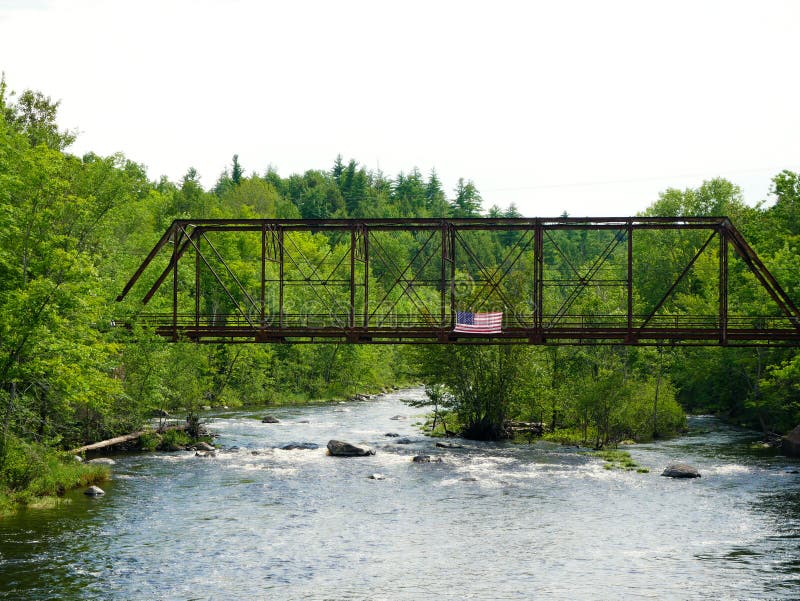 Old Rusty Bridge with USA Flag Stock Image - Image of light ...