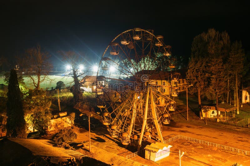 Old Rusty Broken Abandoned Ferris Wheel at Night Stock Photo - Image of ...