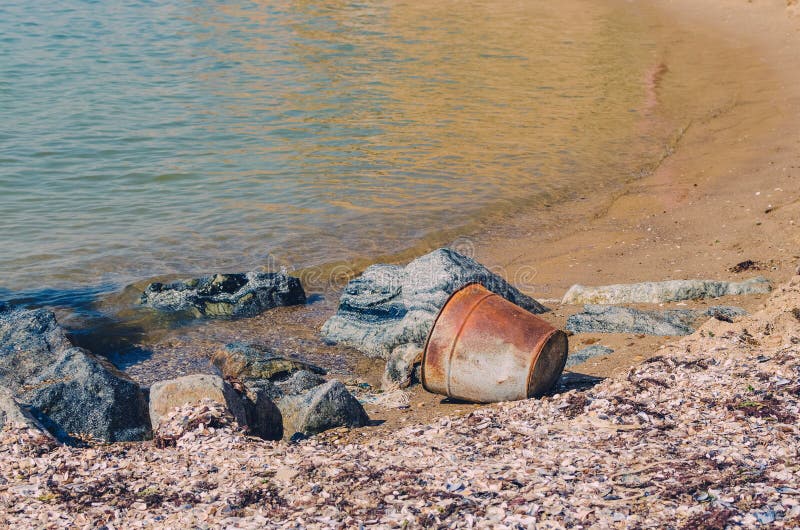 Old Rusty Bucket on a Sandy Beach Stock Photo - Image of garbage ...