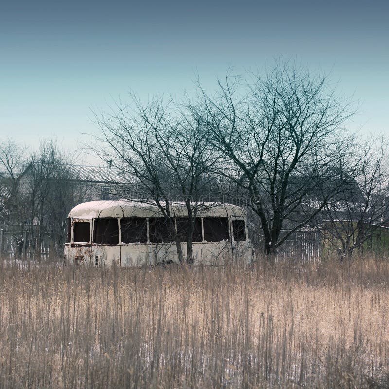 Old rusty bus in the field stock image. Image of auto - 133873601