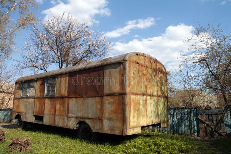 Old Rusty Bus in the Garden Stock Photo - Image of broken, fence: 23219428