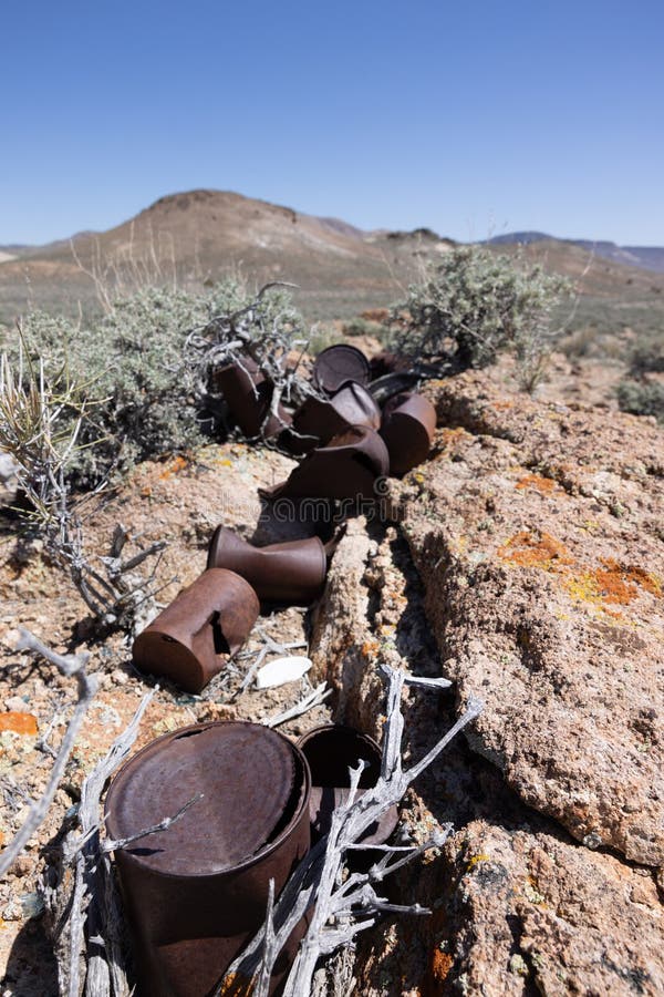 Old Rusty Cans Abandoned in the Desert Stock Photo - Image of cans ...