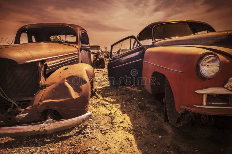 Two Old Rusty Cars in Junk Yard Stock Image - Image of people, yard ...