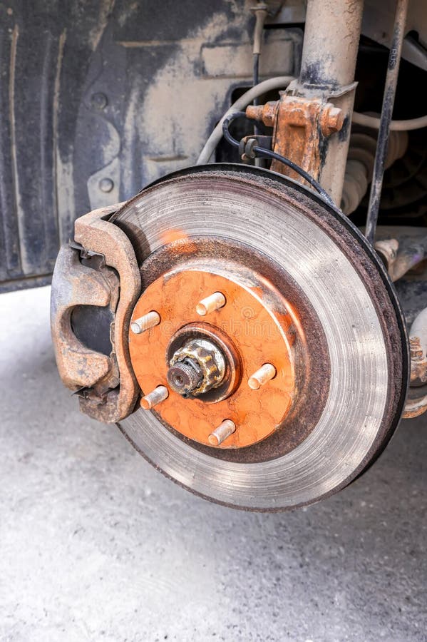 Rusty Car Brake Disc is Lubricated with Copper Grease before Installing ...