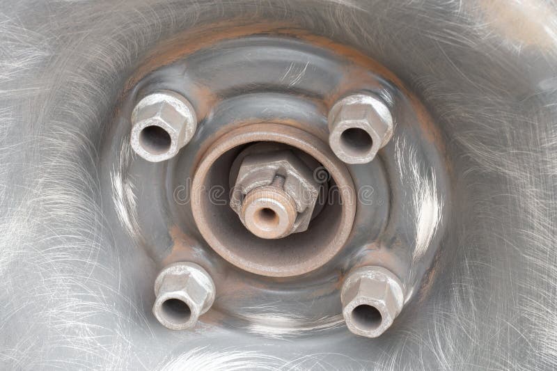 Old Rusty Car Wheels Refinishing Process. Lug Bolts after Removing the ...