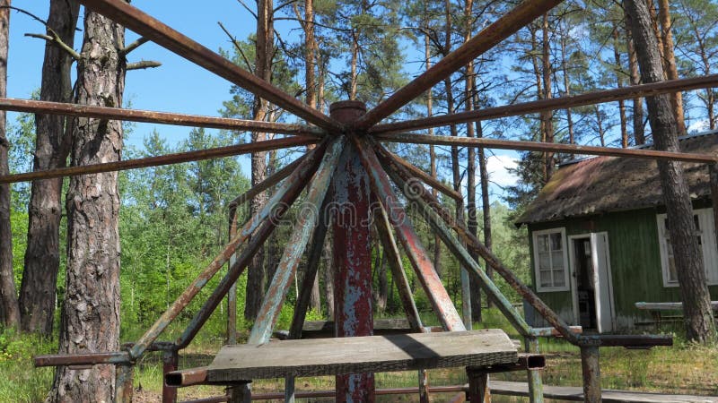 Close-up of a Rusty Carousel in a Pine Forest Stock Footage - Video of ...