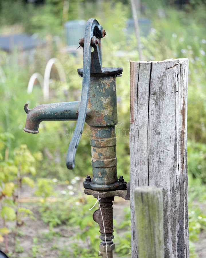 Old and Rusty Cast Iron Water Pump Stock Photo - Image of hand, steel ...