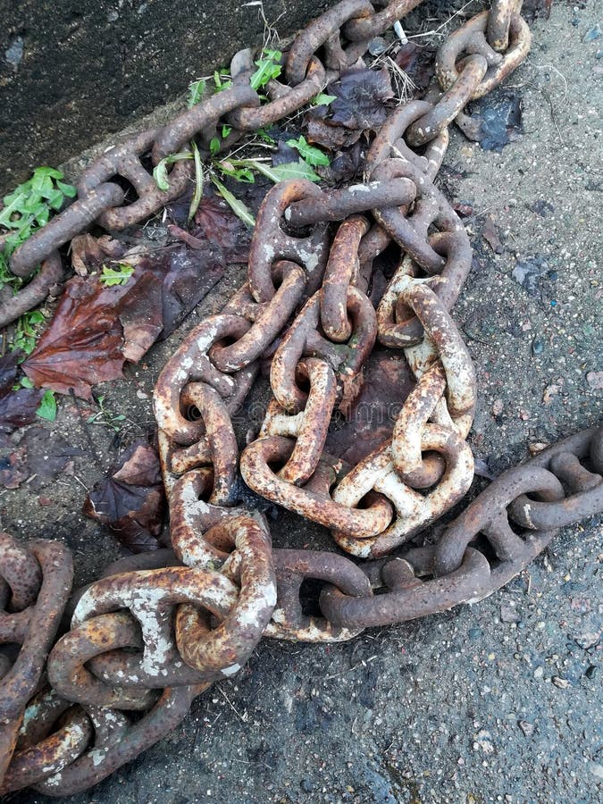 Old Rusty Chain Lying on the Dock Stock Image - Image of chain, rusty ...