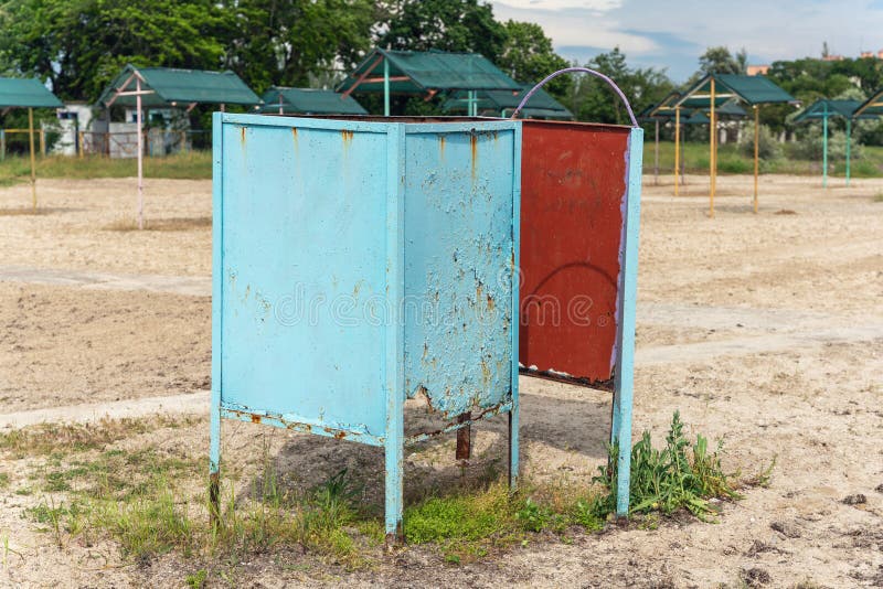 Old Rusty Changing Rooms on an Abandoned Sea Beach Stock Photo - Image ...