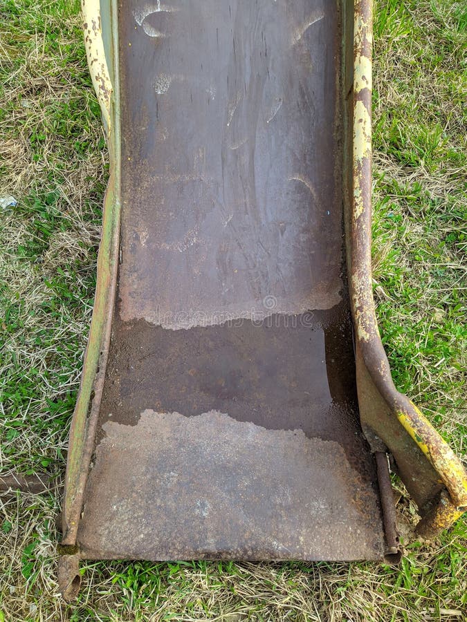 Old and Rusty Children S Slide in the Daytime Stock Photo - Image of ...