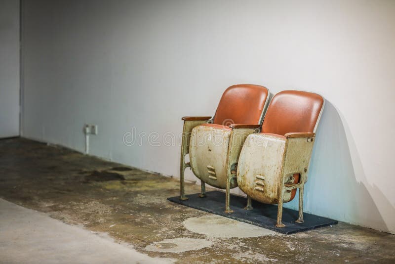Old rusty cinema chair stock image. Image of seats, orange - 83467307