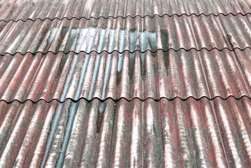 Old Rusty Corrugated Iron Roofing with Rain Drops. Roofing Background ...