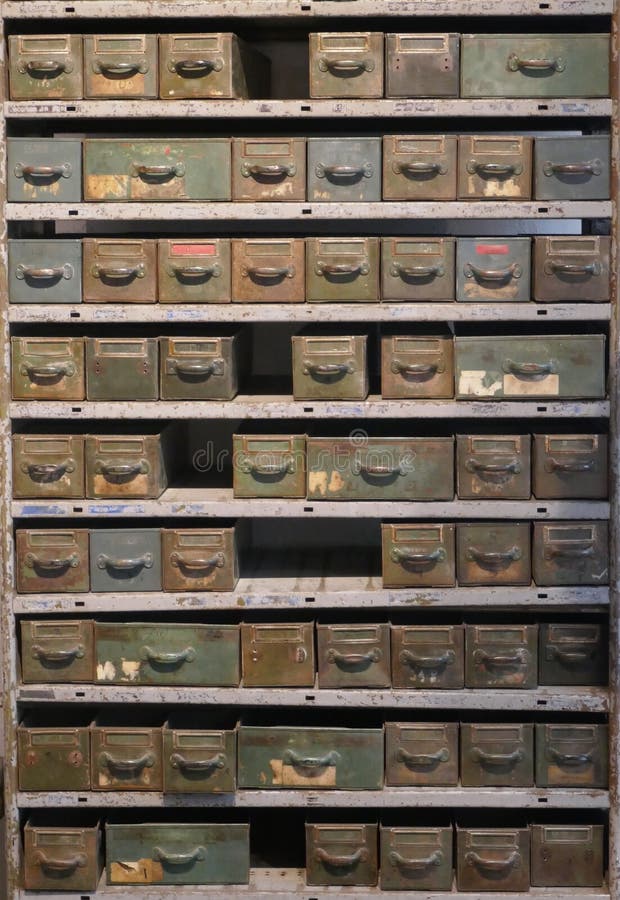 Old Rusty Shelf with Many Drawers and Boxes for in a Disused Workshop ...