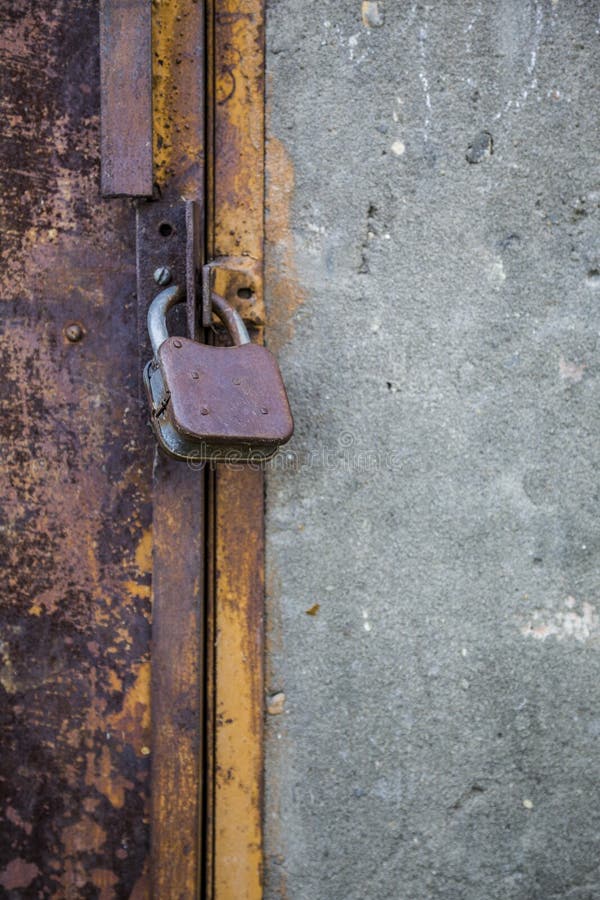 Old rusty door with a lock stock photo. Image of copy - 92461212