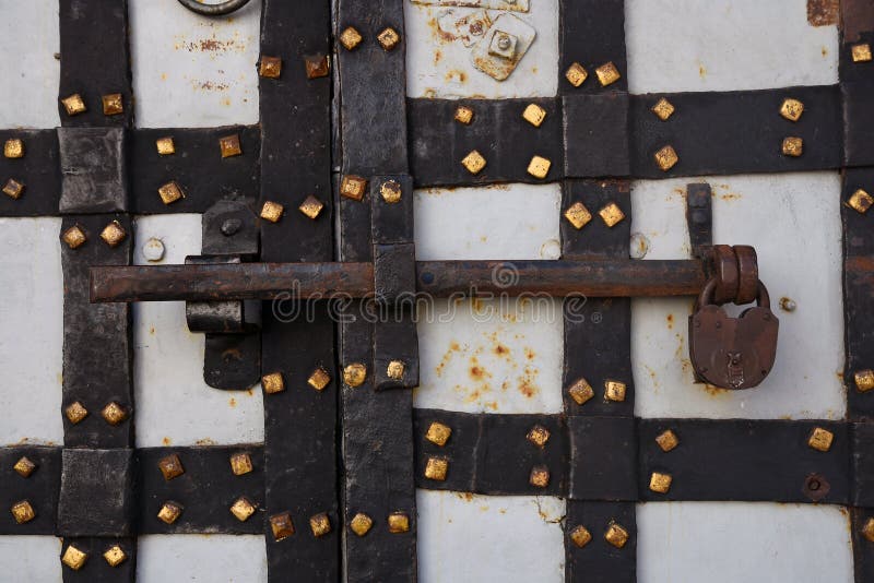 Old rusty door with lock. stock photo. Image of brown - 244998842