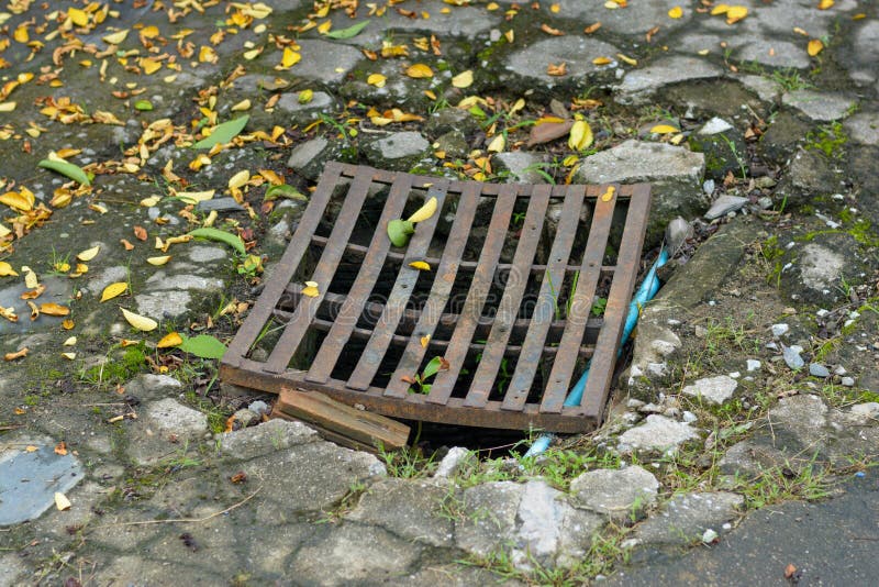 Rusty Drain Grate on Manhole Cover Stock Image - Image of sewage ...