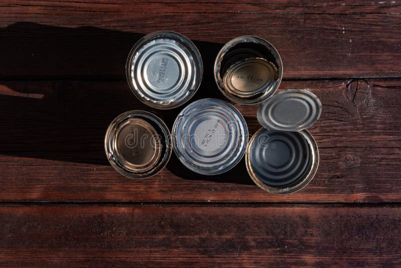 Iron Empty Cans on a Wooden Table Stock Photo - Image of brown, retro ...