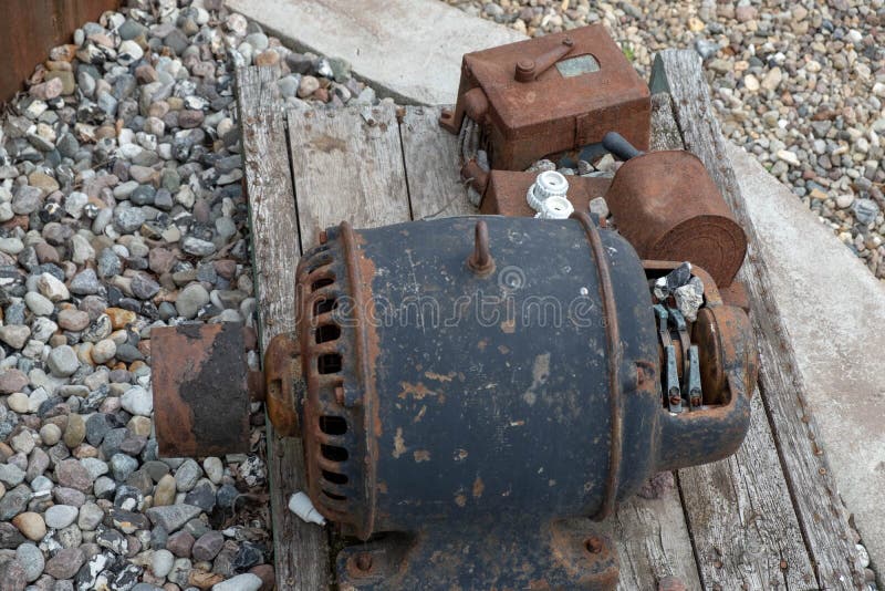An Old, Rusty Engine Lies on a Board. Stock Photo - Image of anymoren ...