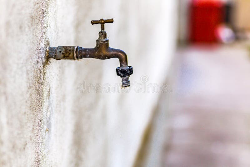 Old rusty faucet leaks stock image. Image of stream, wasting - 74665263