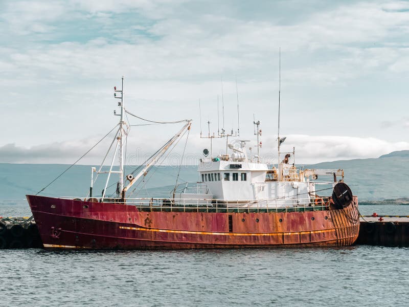 Old Rusty Fishing Boat Parked in the Icelandic Harbour Stock Image ...