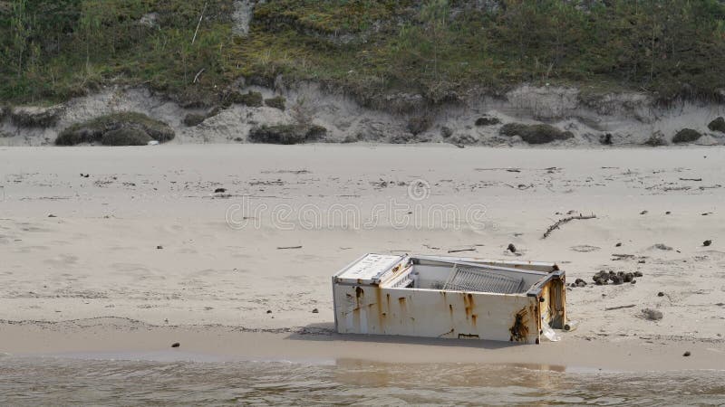 Rusty Fridge on a Beach. Earth Pollution Concept Stock Footage - Video ...