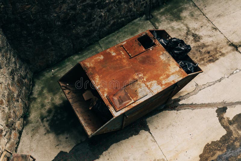 Old Rusty Garbage Container Full of Trash in Plastic Bags Stock Image ...
