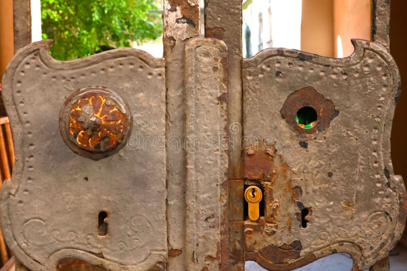Old Rusty Gate with a Lock in Front of the House. Stock Image - Image ...