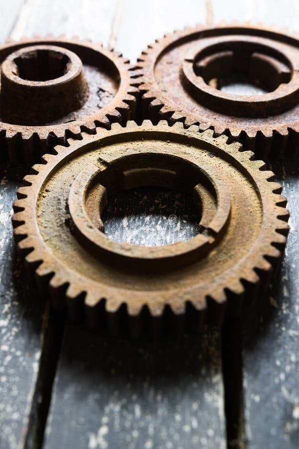 Old rusty gears stock photo. Image of table, wooden - 174859556