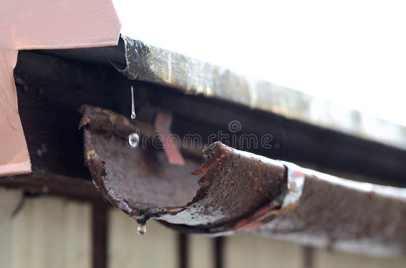 Old Rusty Gutter in the Rain Stock Image - Image of rusty, gutter ...