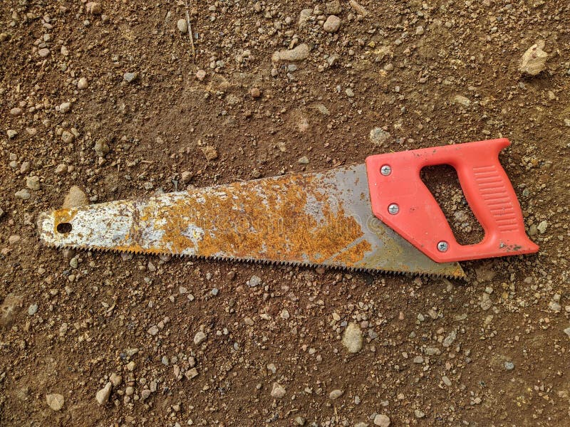 Old and Rusty Hacksaw on the Ground Top View Stock Image - Image of ...