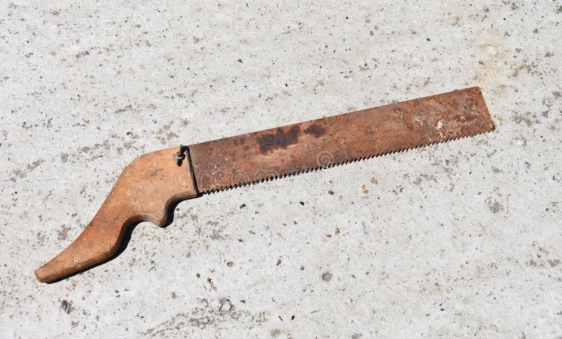 Old and Rusty Hand Saw with Wooden Handle Stock Photo - Image of ...
