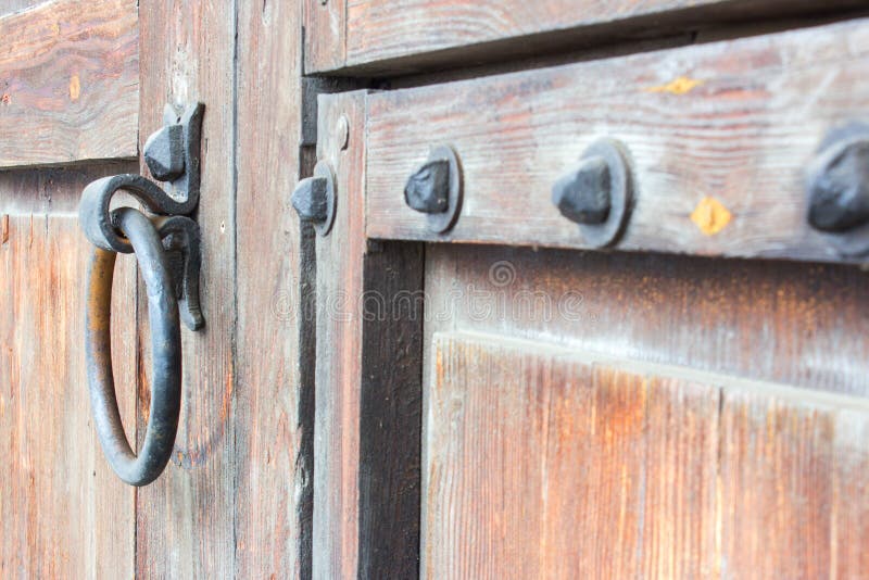 Old Rusty Handle on a Wooden Door Stock Image - Image of background ...