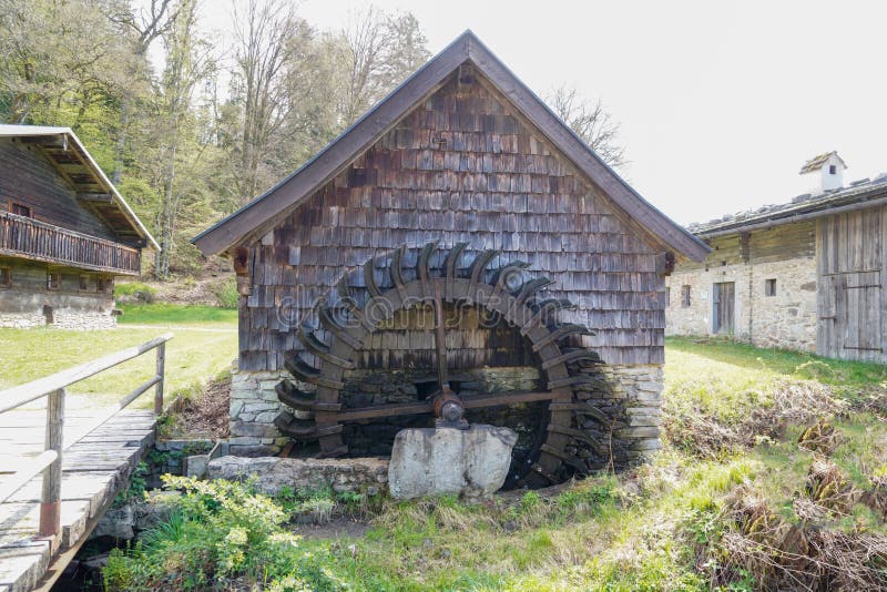Old rusty home water mill stock image. Image of stream - 257058025