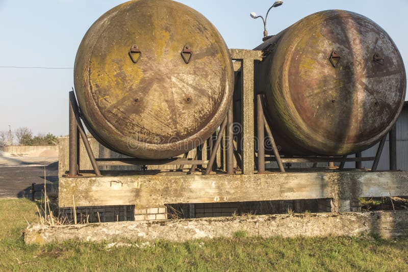 Old rusty industrial tanks stock image. Image of valve - 178240039