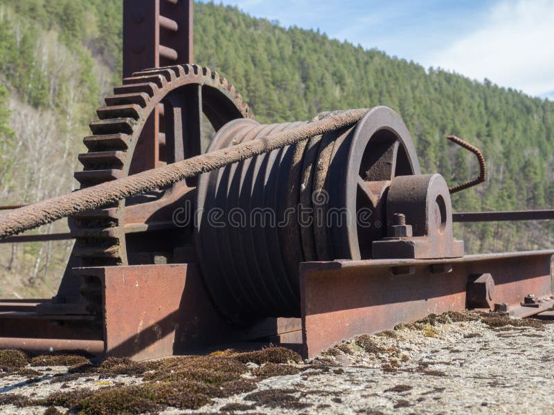 Old Rusty Industrial Winch with Rope and Gear Stock Photo - Image of ...