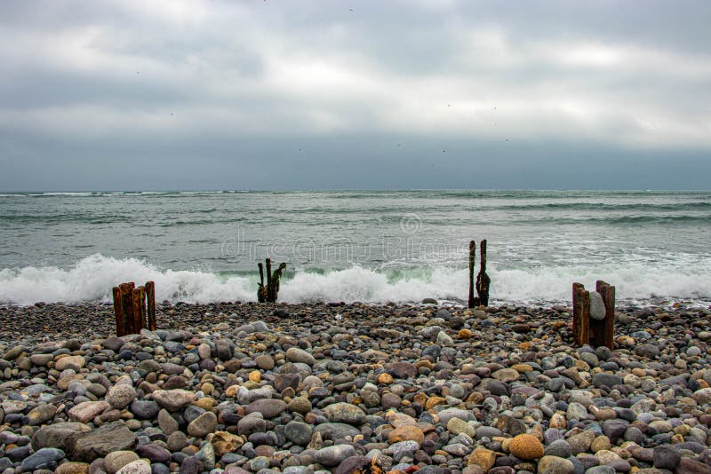 Old Rusty Iron in the Beach Stock Image - Image of lima, beach: 196798579